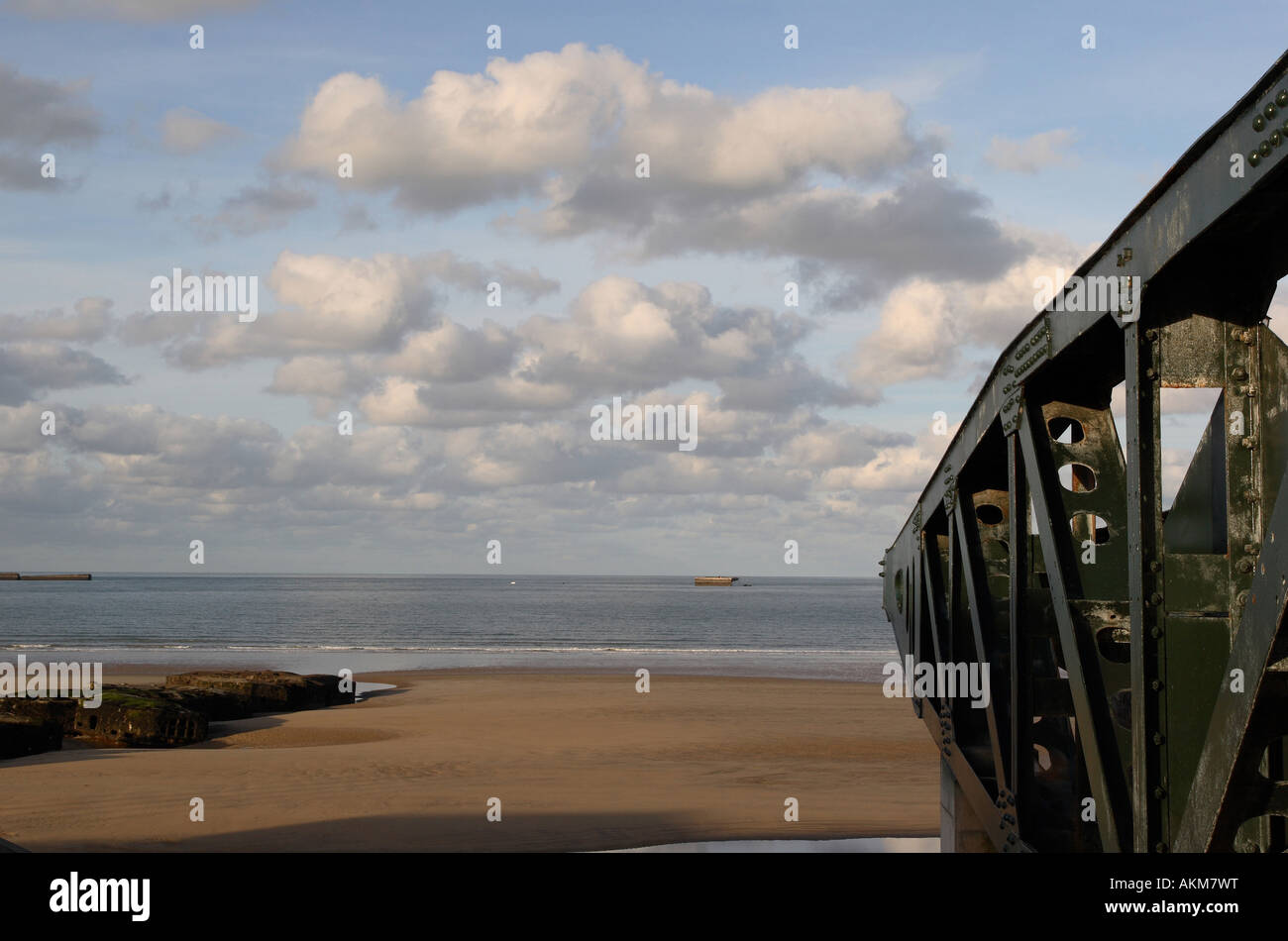 A Bailey bridge overlooking the remains of the Mulberry Harbour used on ...