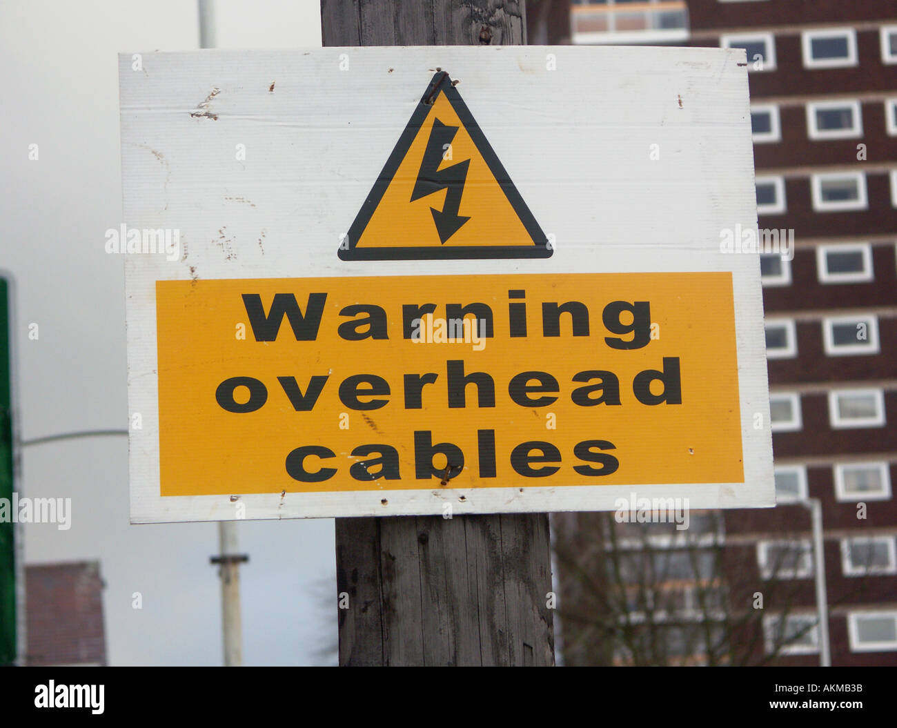 Warning Overhead Cables Sign Stock Photo - Alamy