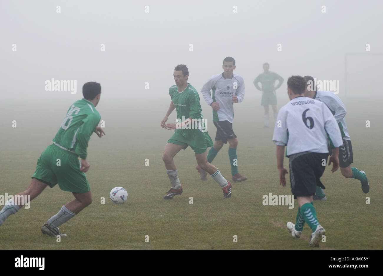 Sunday League football in fog at Harbury Lane, Leamington Spa, England ...
