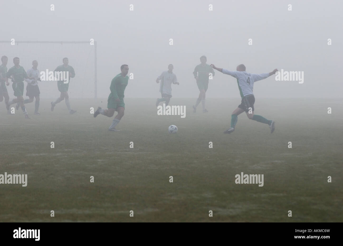 Sunday League football in fog at Harbury Lane, Leamington Spa, England ...
