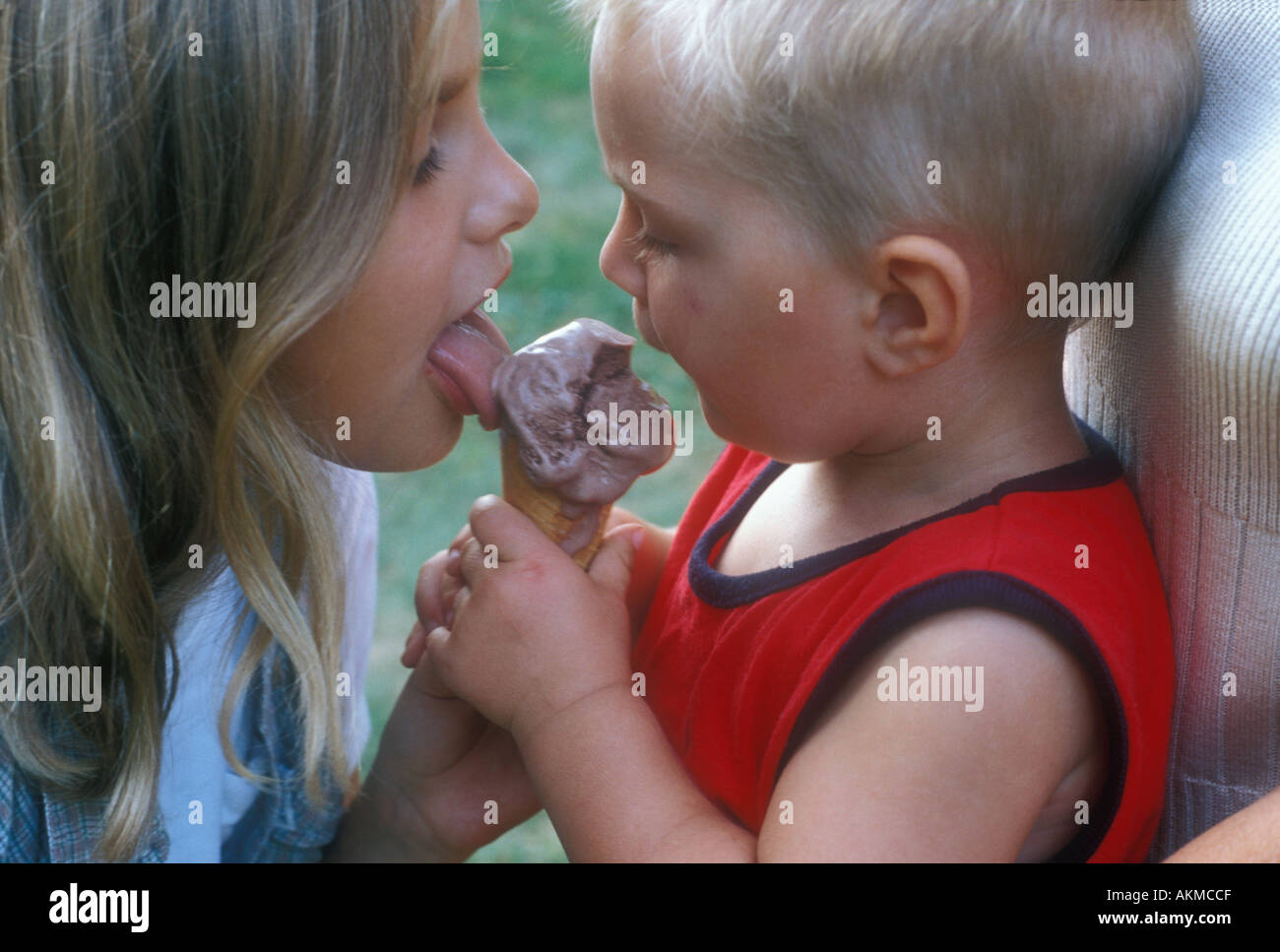 Boy eating melting ice hi-res stock photography and images - Alamy