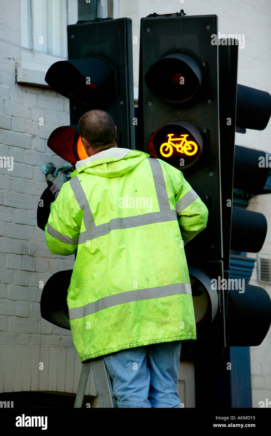 Man Fixing Traffic Lights Stock Photo - Alamy