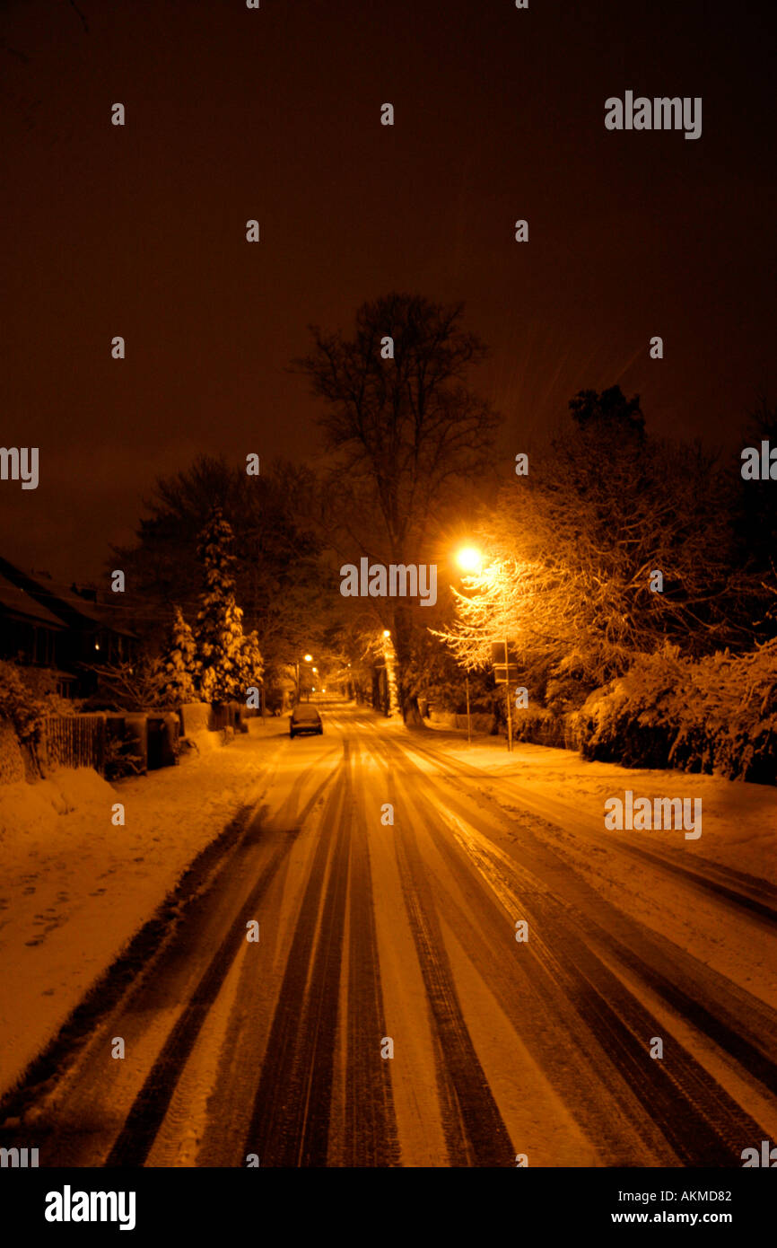Snowy Suburban Street UK Late Night Stock Photo - Alamy