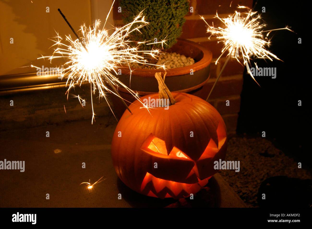 Halloween Pumpkin With Sparklers Stock Photo - Alamy