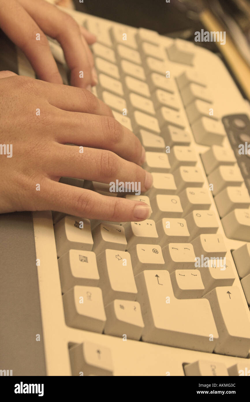 typing on a keyboard Stock Photo - Alamy