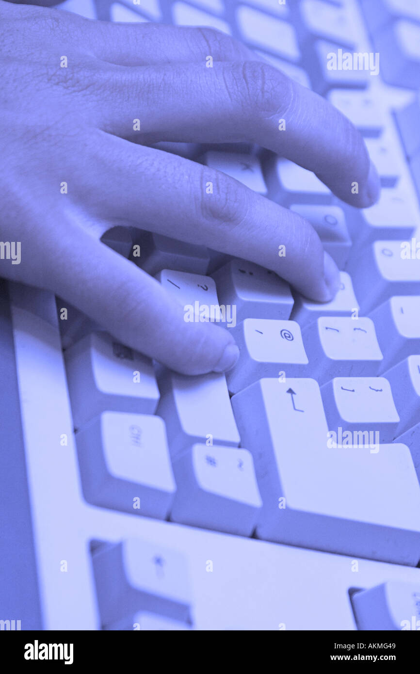 typing on a keyboard Stock Photo - Alamy