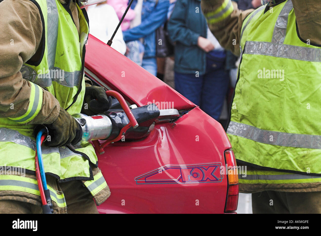 Firemen use a hydraulic cutter hi-res stock photography and images - Alamy