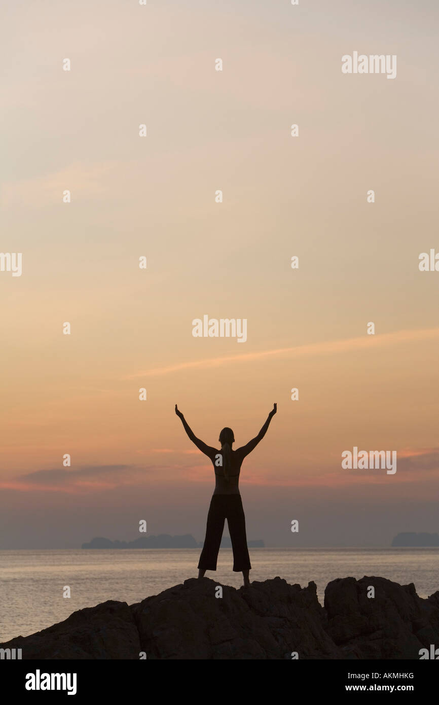 Person with arms raised Stock Photo - Alamy