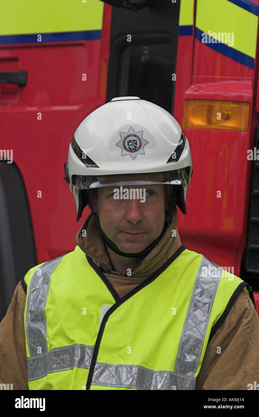 firman in front of fire engine Stock Photo - Alamy