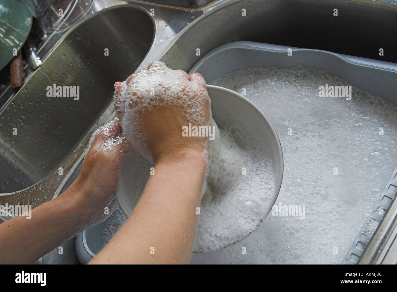 Lady washing hi-res stock photography and images - Alamy