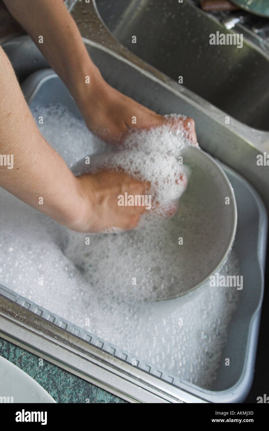 Washing lady hi-res stock photography and images - Alamy