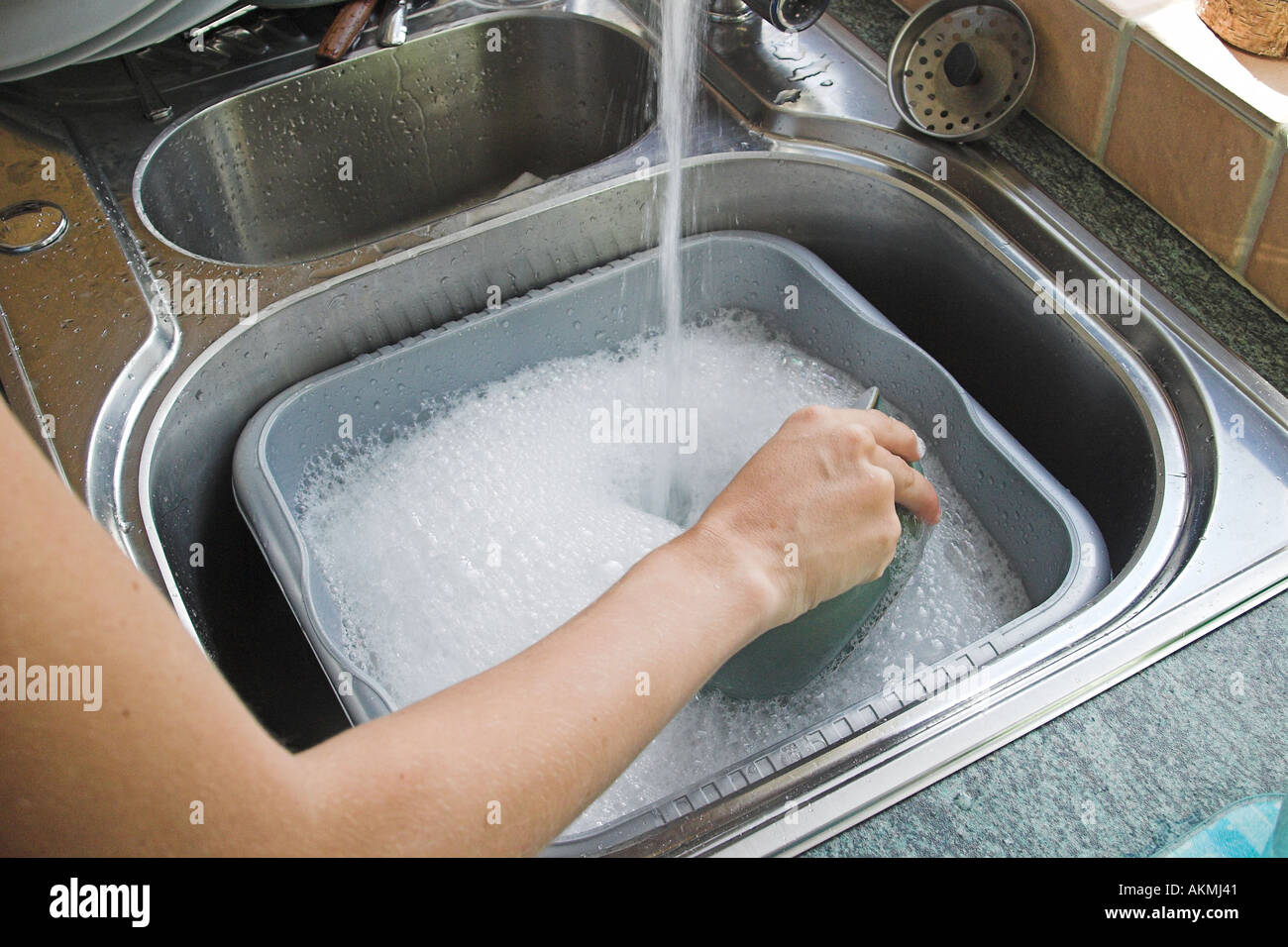 Washing lady hi-res stock photography and images - Alamy