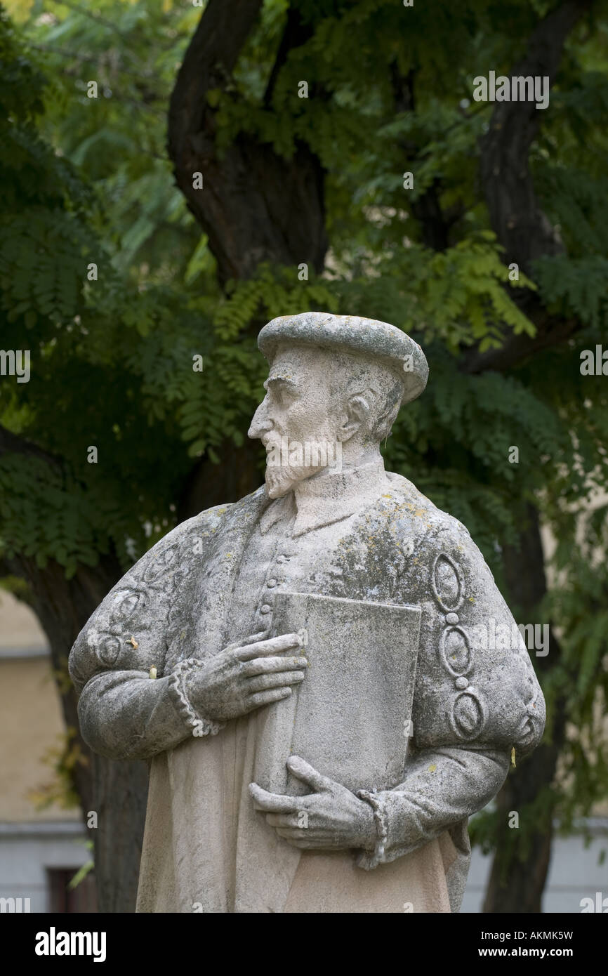 A poet statue against green background composed by leaves Stock Photo ...