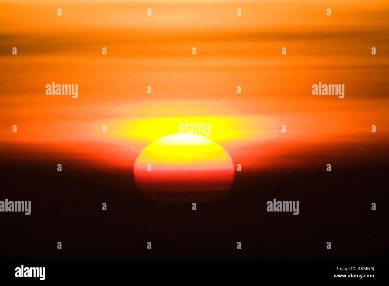 the sun rising at dawn Stock Photo - Alamy