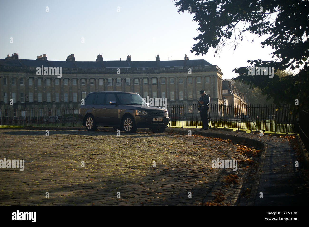 Range Rover Getting a Parking Ticket. Royal Crescent Bath Stock Photo ...