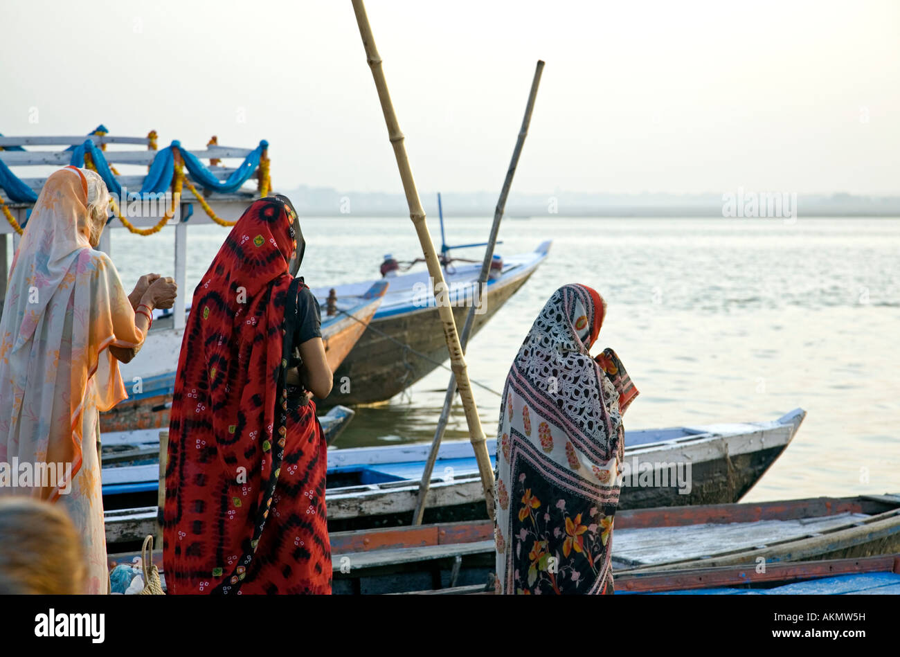 Women praying. Shivala Ghat. Ganges river. Varanasi. India Stock Photo ...
