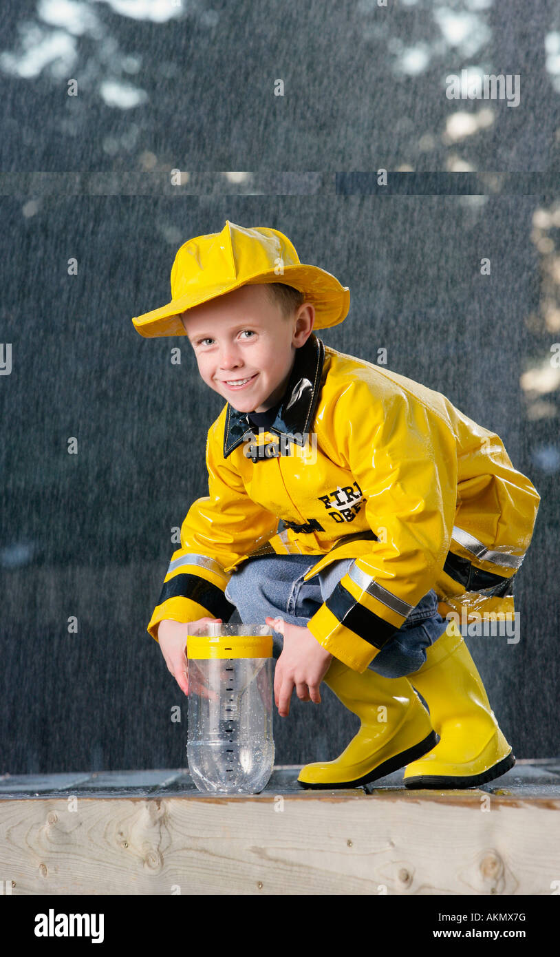Boy in the rain Stock Photo - Alamy
