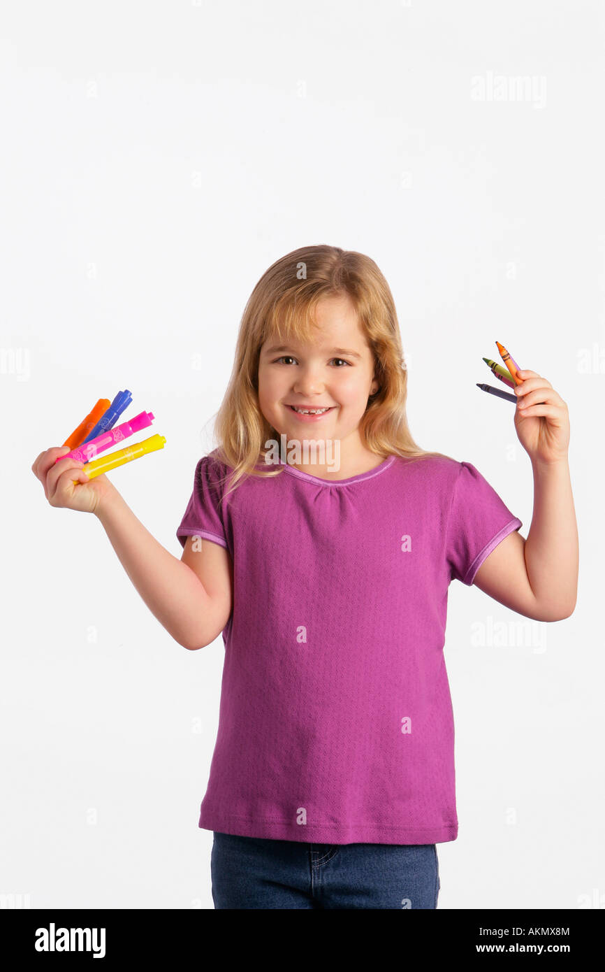 Girl with crayons and markers Stock Photo - Alamy