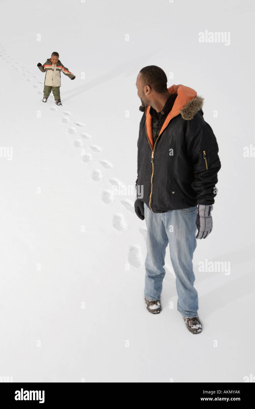 Child following footprint hi-res stock photography and images - Alamy