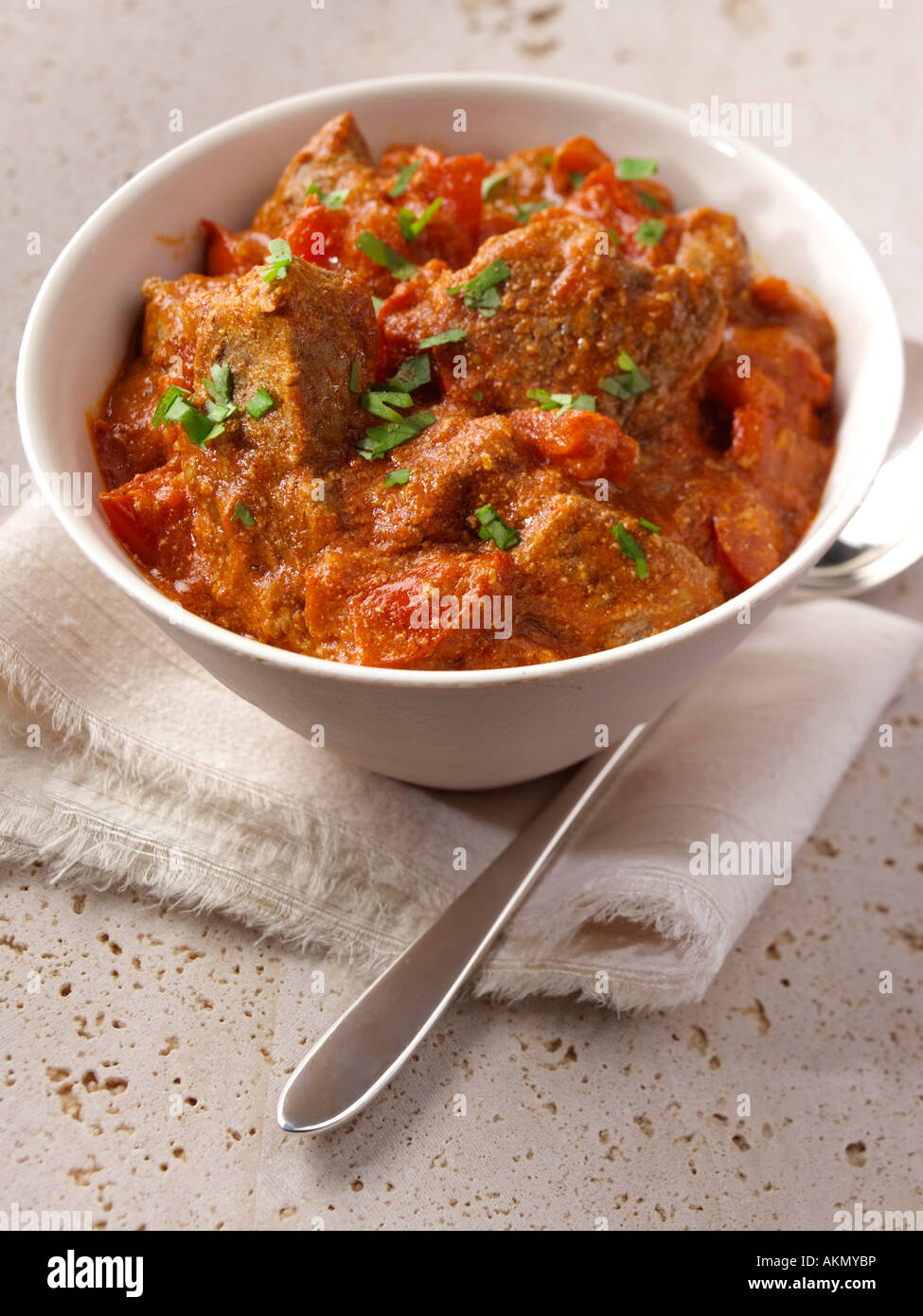 A bowl of Indian Rogan Josh editorial food Stock Photo - Alamy
