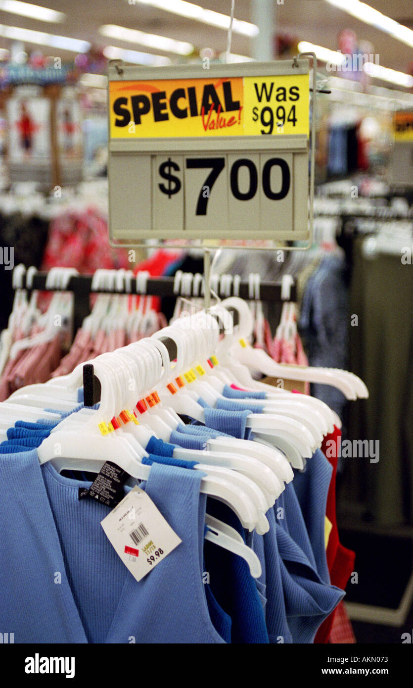 point of sale discount signs in a store advertise sale prices on ...