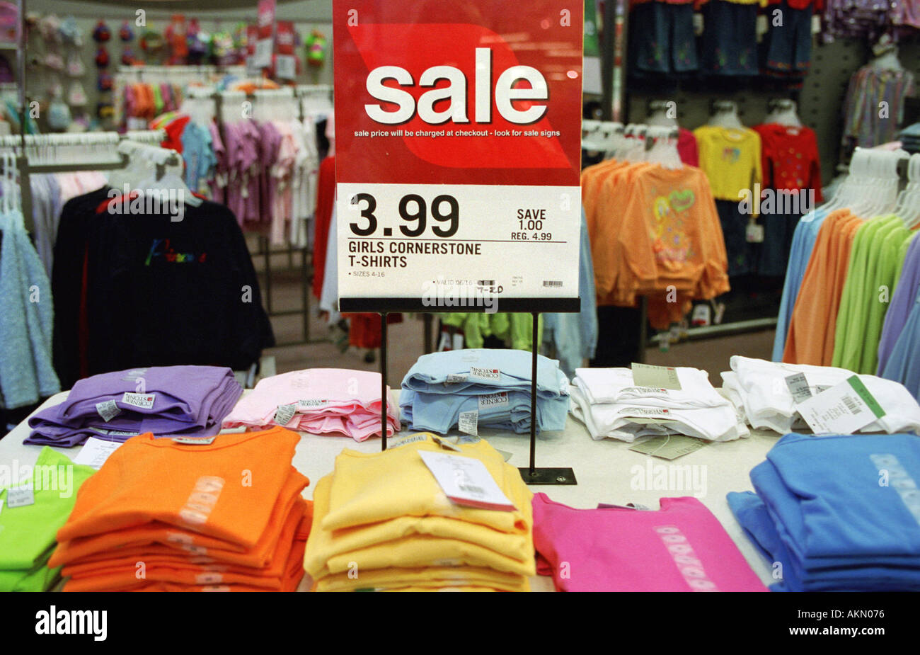 point of sale discount signs in a store advertise sale prices on ...