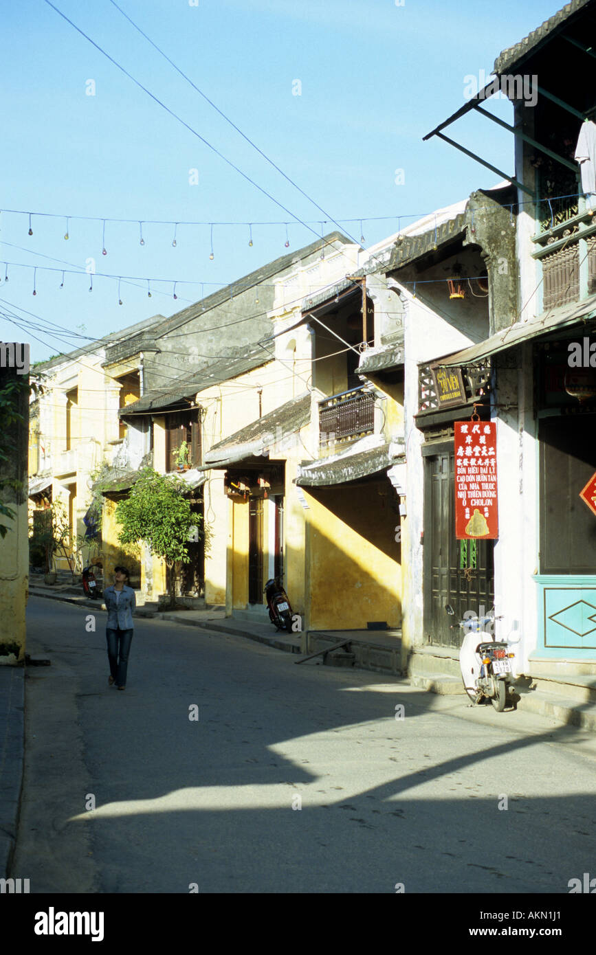 Traditional narrow shop houses in Nguyen Thai Hoc St, early morning ...