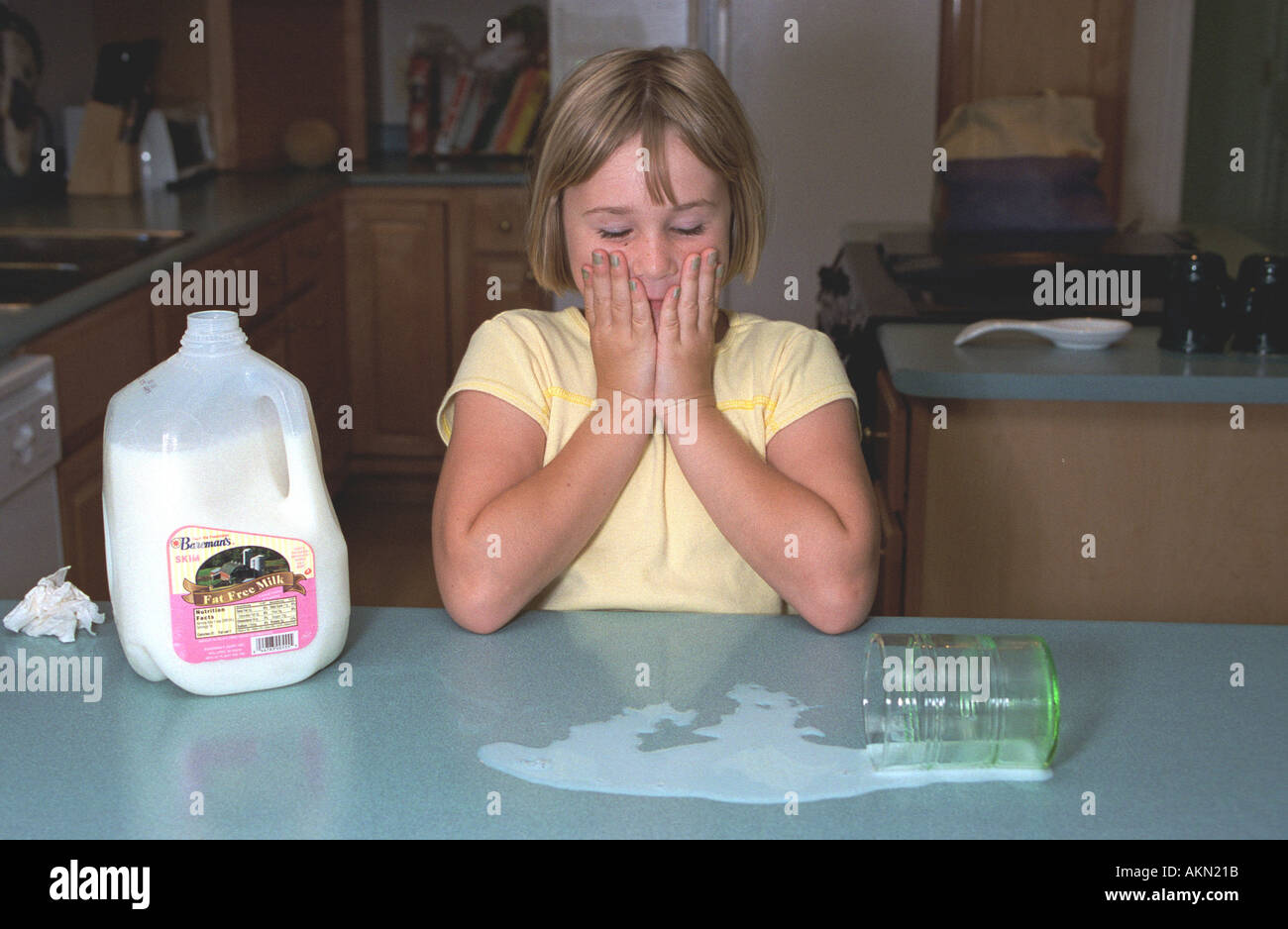7 year old child spills milk on counter and fears she will be ...