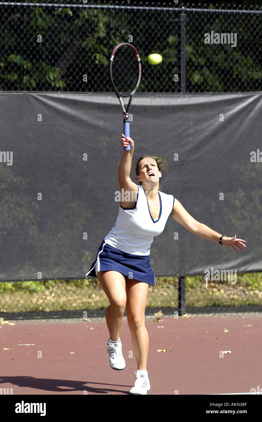Female doubles match at a high school tennis meet Stock Photo - Alamy
