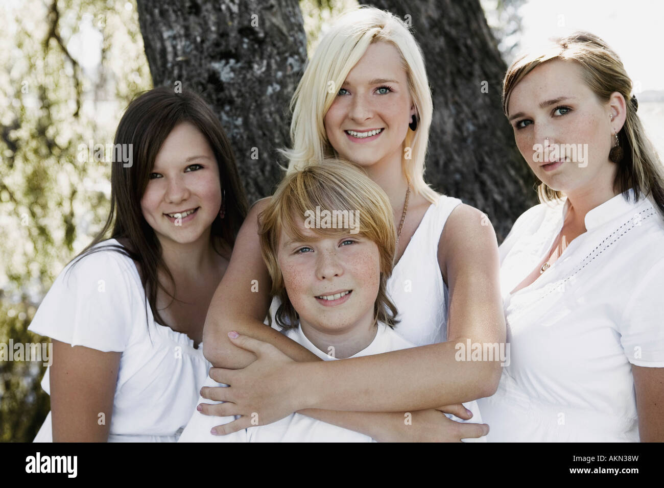 Portrait of four siblings Stock Photo - Alamy