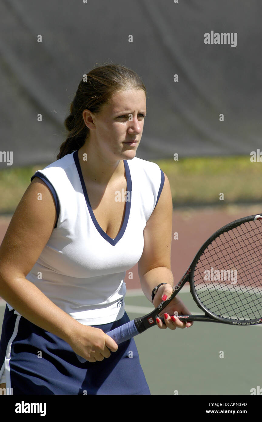 Female doubles match at a high school tennis meet Stock Photo - Alamy