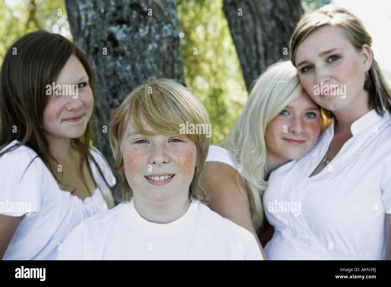 Portrait of four siblings Stock Photo - Alamy