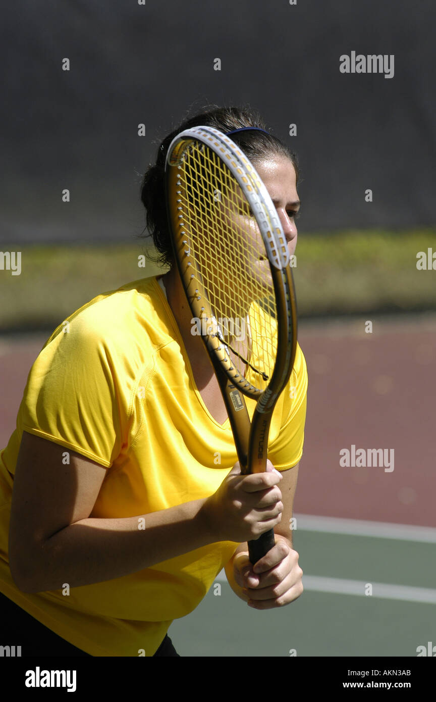 Female doubles match at a high school tennis meet Stock Photo - Alamy