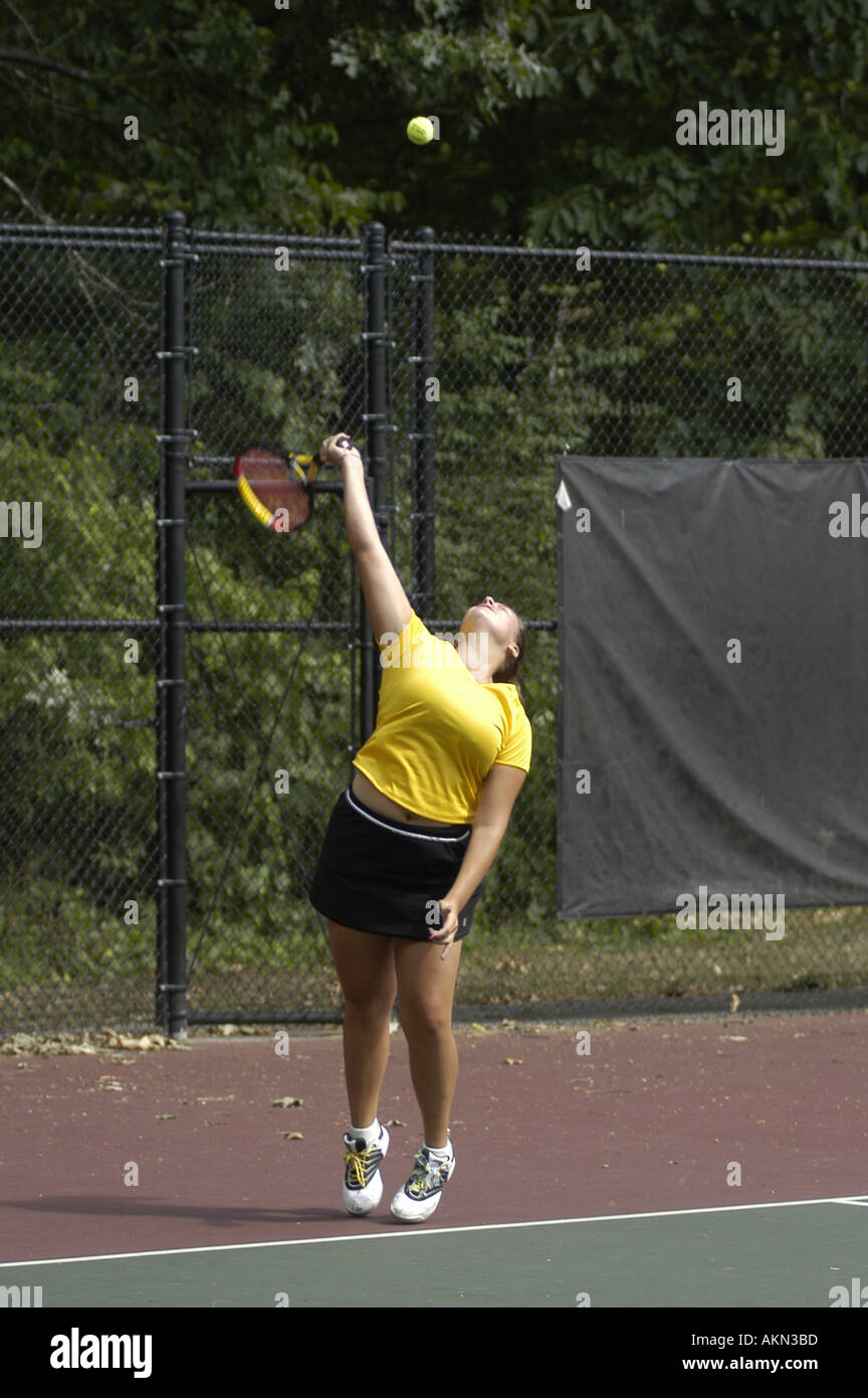 Female doubles match at a high school tennis meet Stock Photo - Alamy