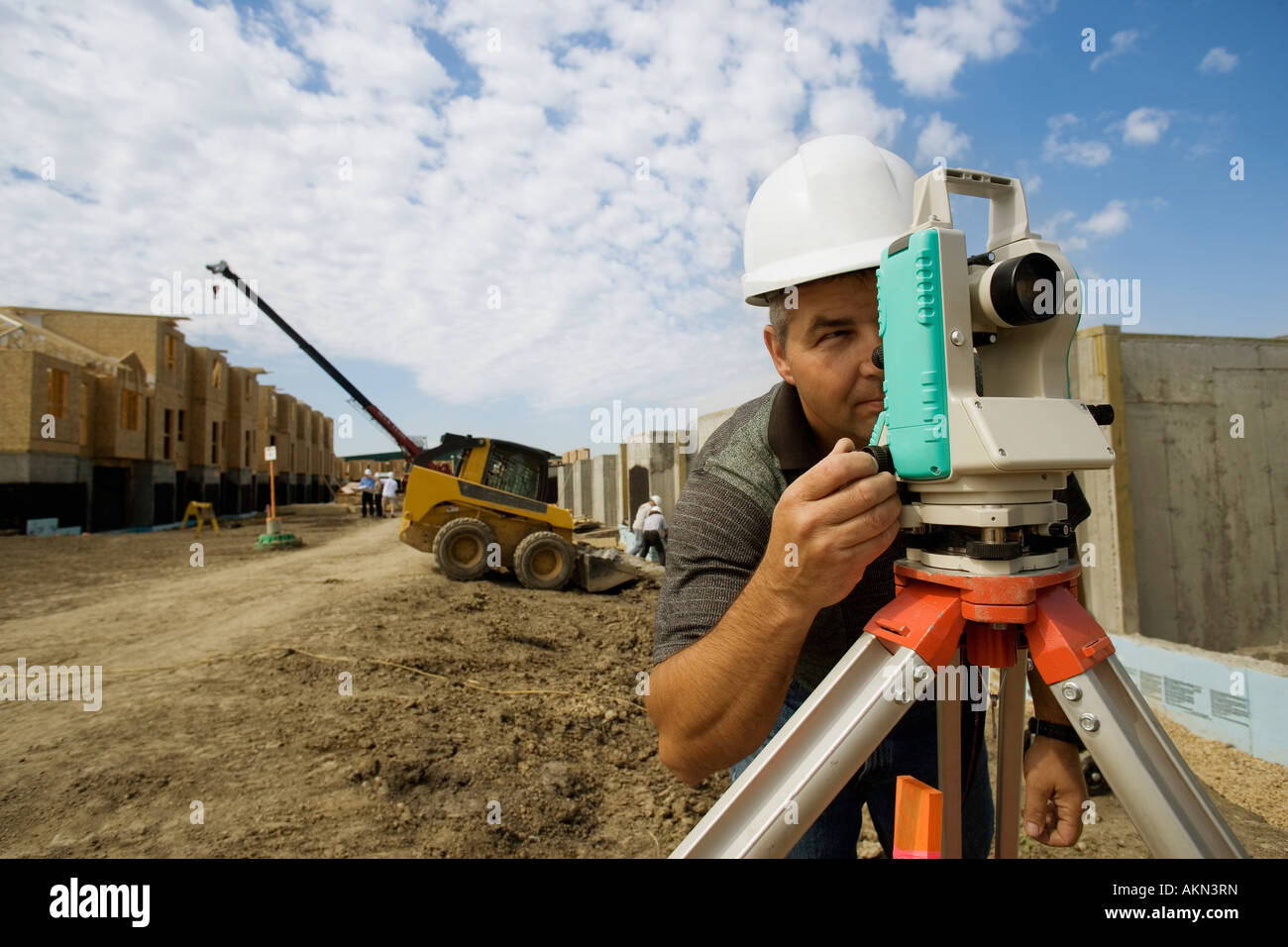 A surveyor at a construction site Stock Photo - Alamy