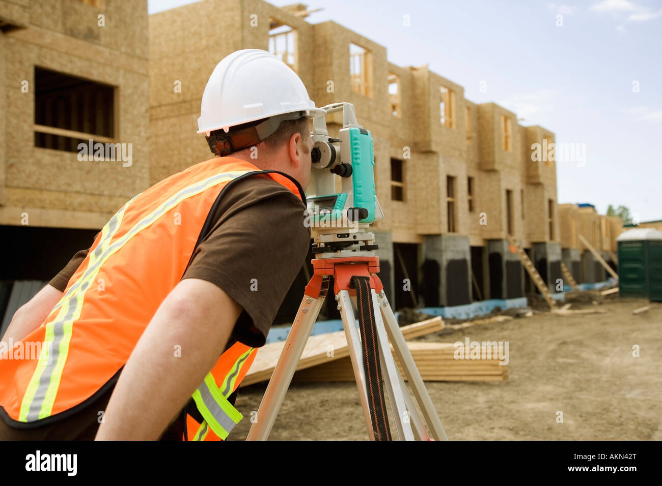Surveyor on construction site Stock Photo - Alamy