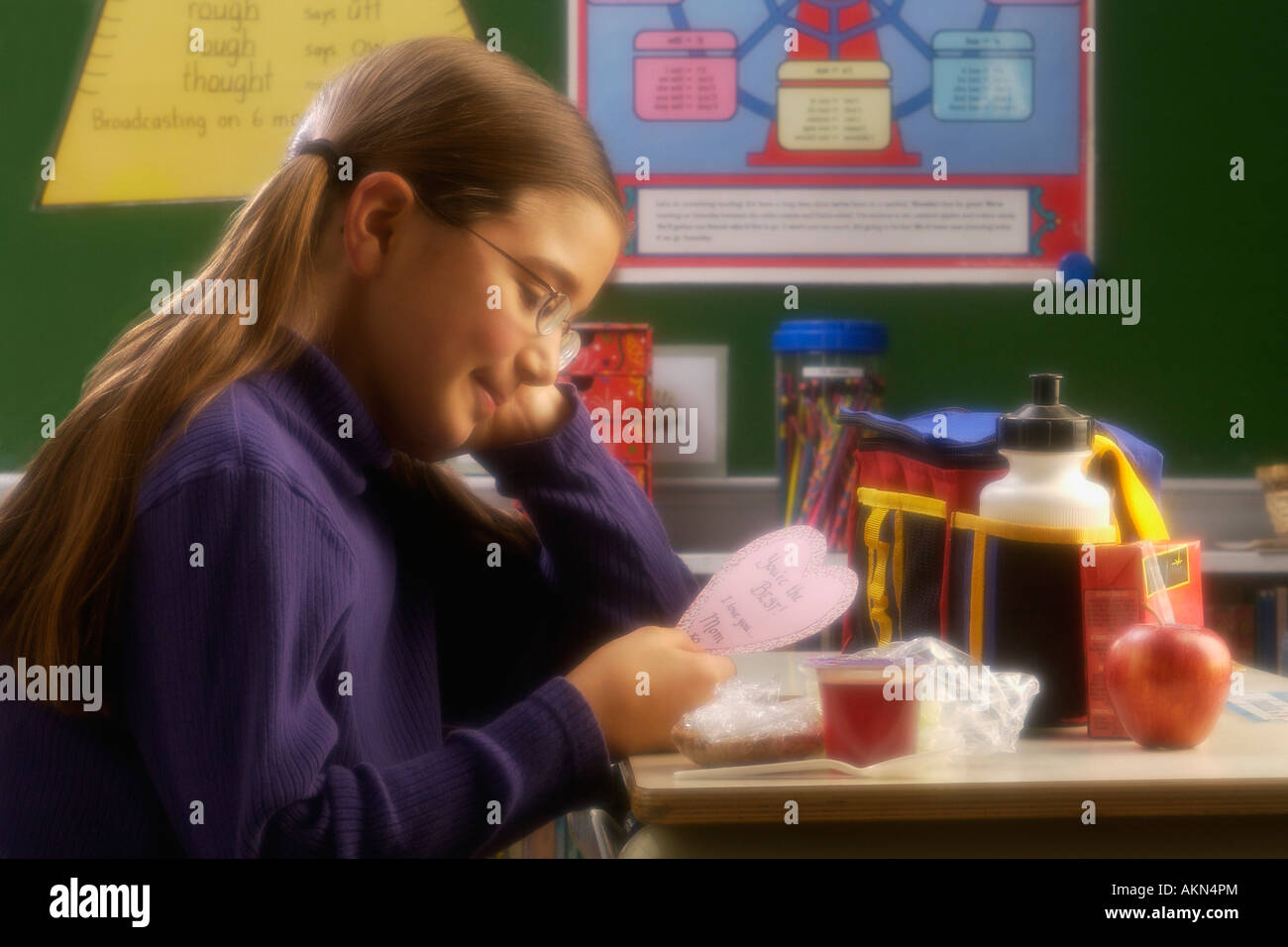 Girl reading note Stock Photo - Alamy