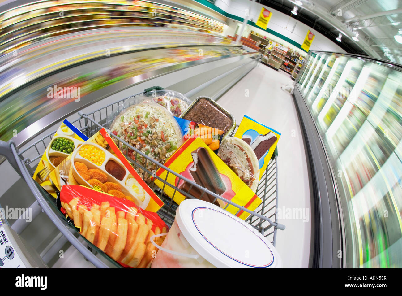 Shopping cart with food Stock Photo - Alamy