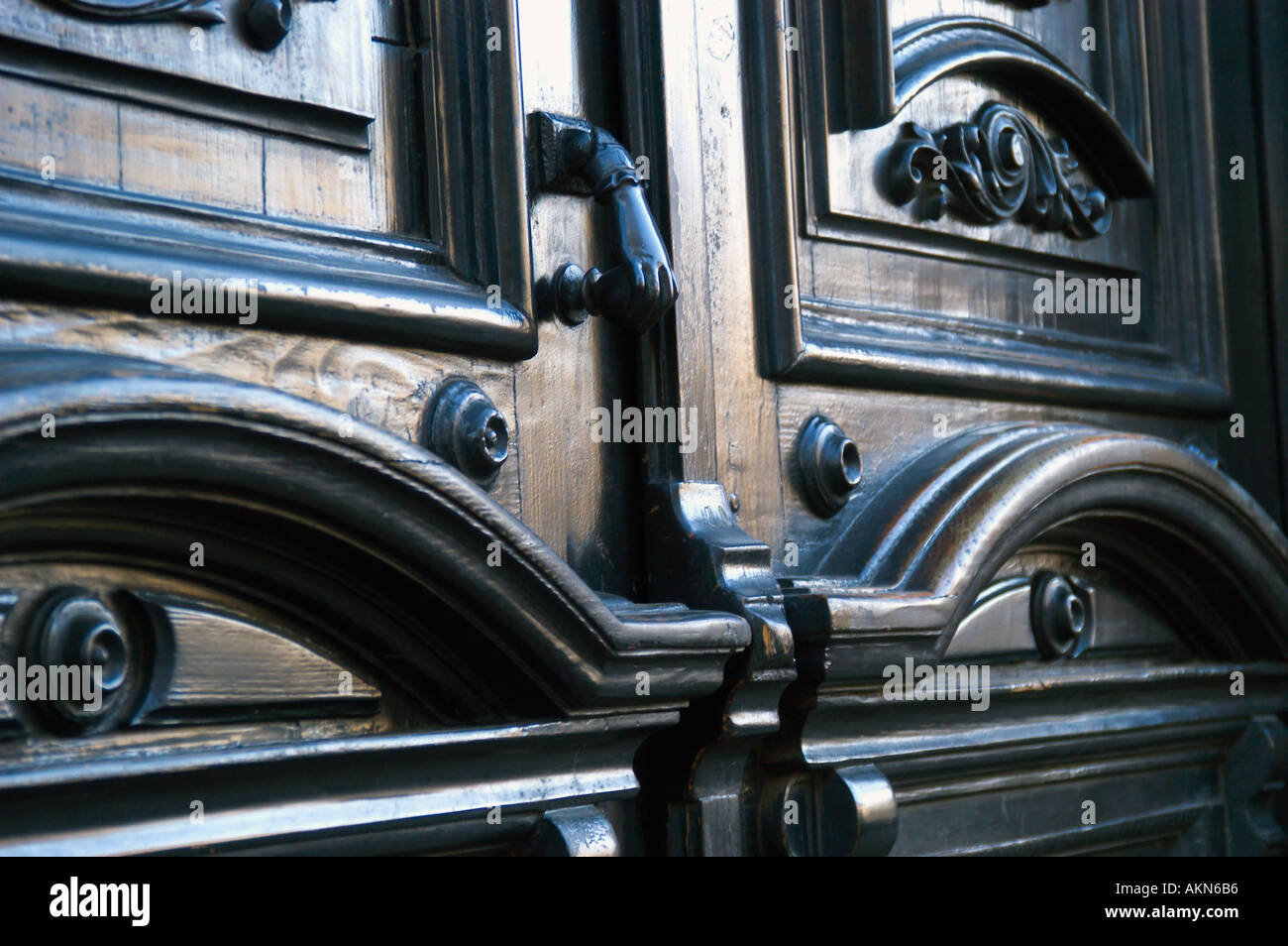 wood door with knockers Stock Photo - Alamy