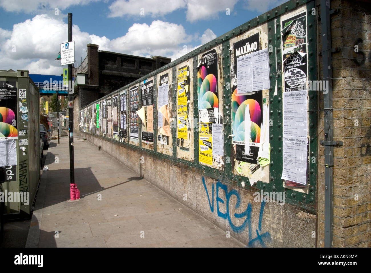 Music posters on London's Brick Lane Stock Photo - Alamy