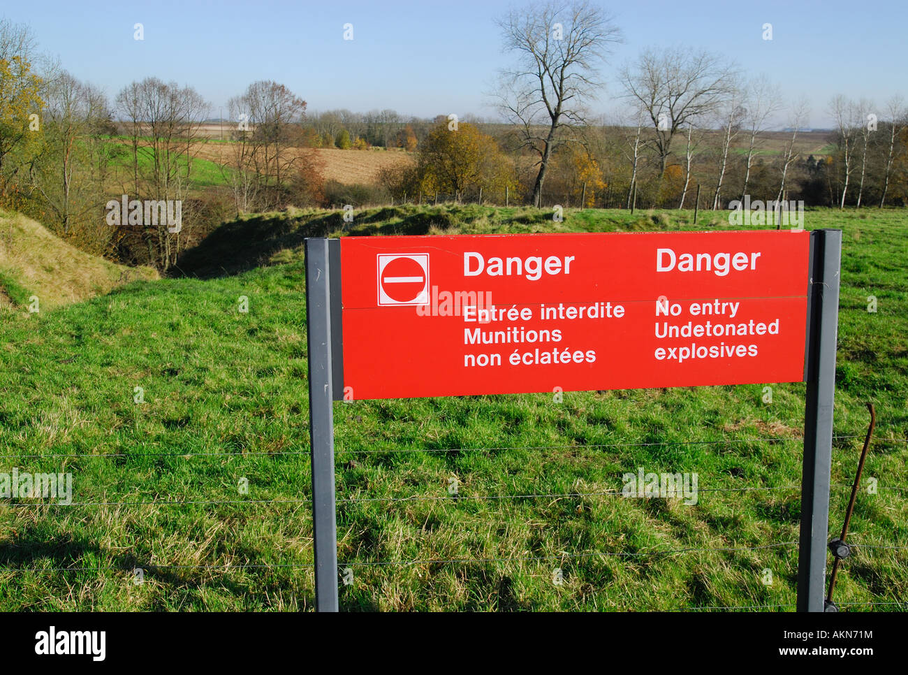 Sign warning of undetonated explosives, World War One battlefield ...