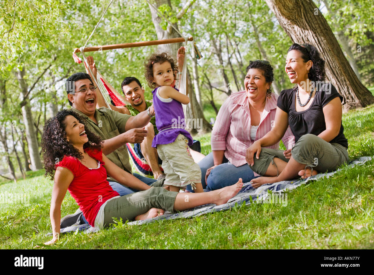 A family in the park Stock Photo - Alamy