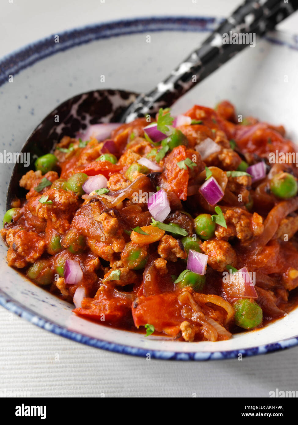 A bowl of spicy Indian Keema Mutter editorial food Stock Photo - Alamy
