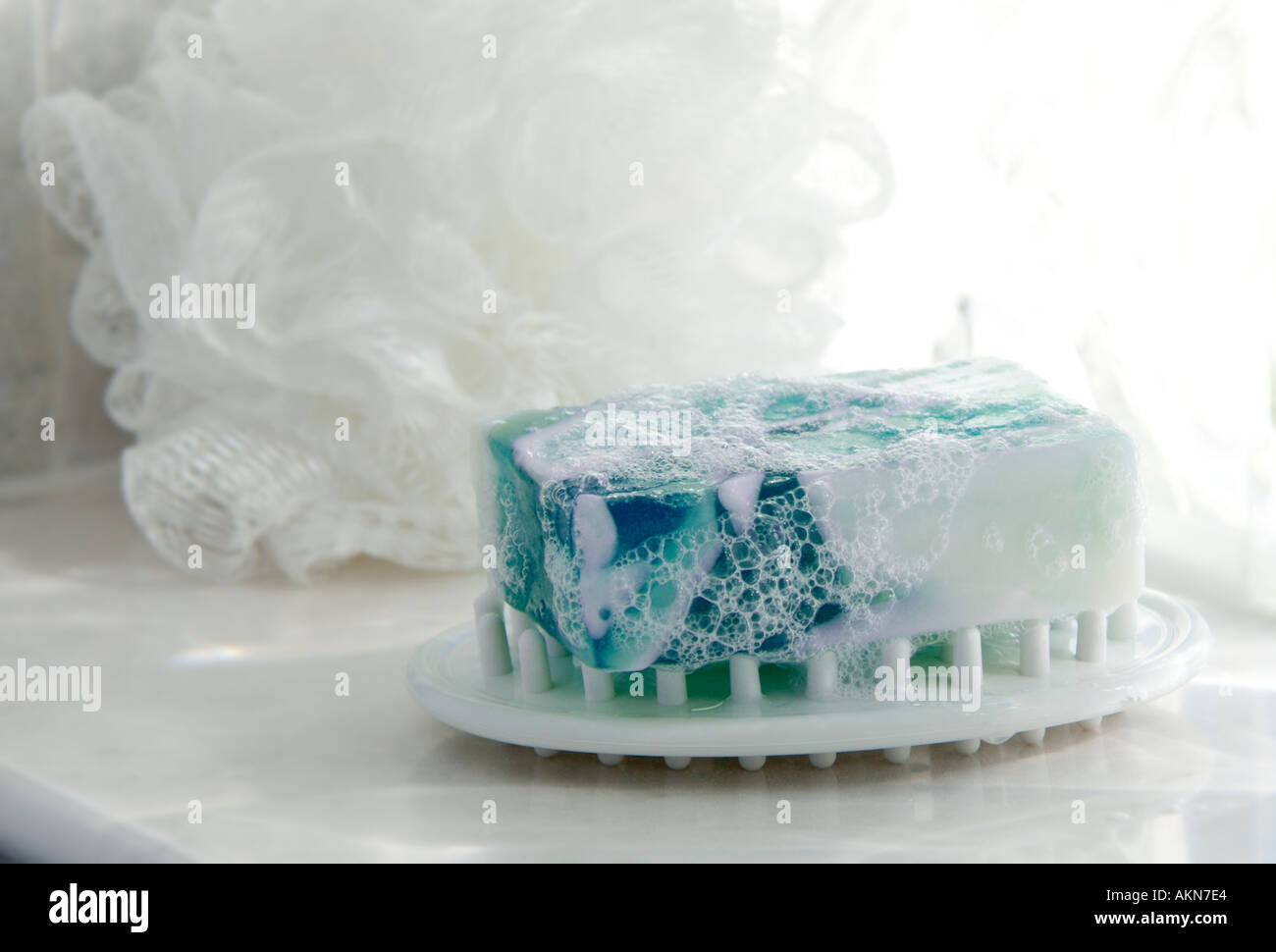 Bar of glycerin soap on a soap dish in a window sill Stock Photo - Alamy