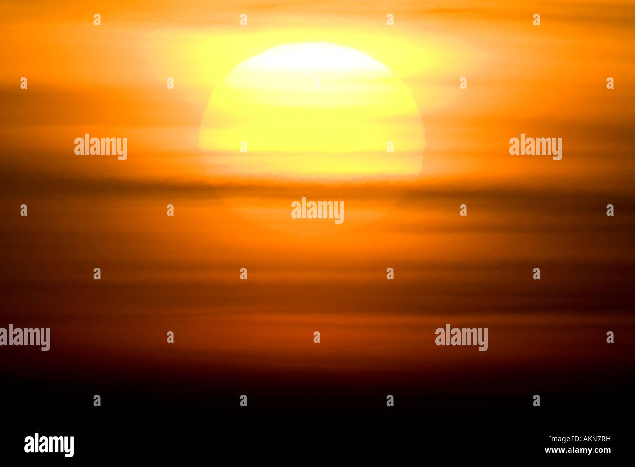 the sun rising at dawn Stock Photo - Alamy