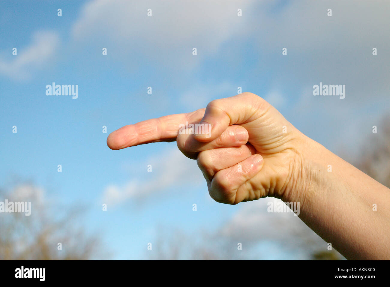 Hand pointing left front to signal left Stock Photo - Alamy