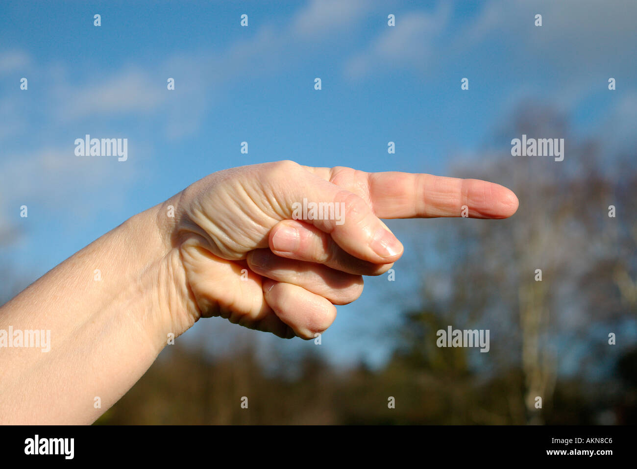 Hand pointing right front Stock Photo - Alamy