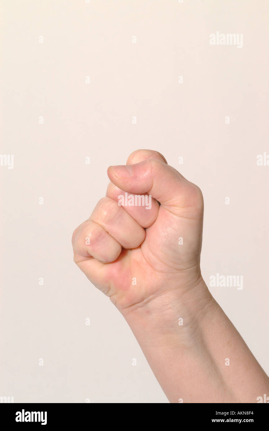 Hand clenched fist Stock Photo - Alamy