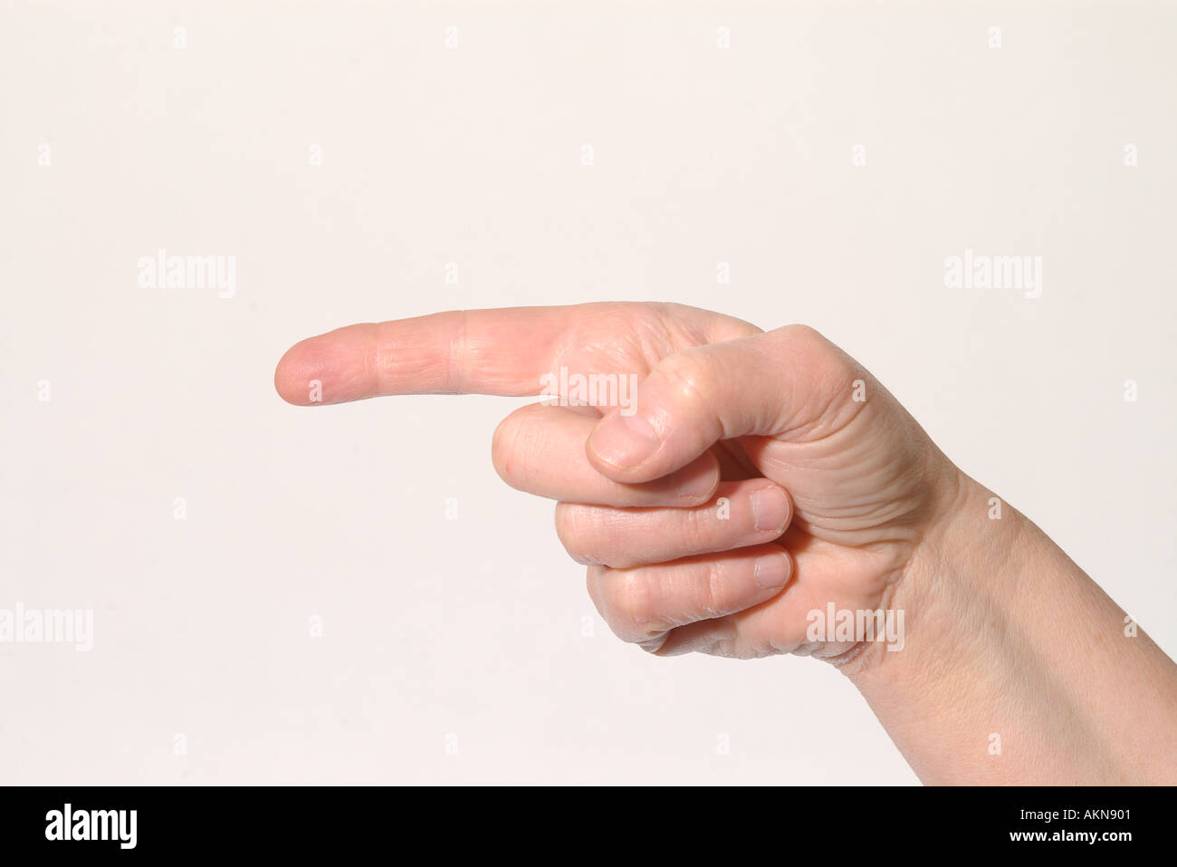 Hand pointing left front Stock Photo - Alamy