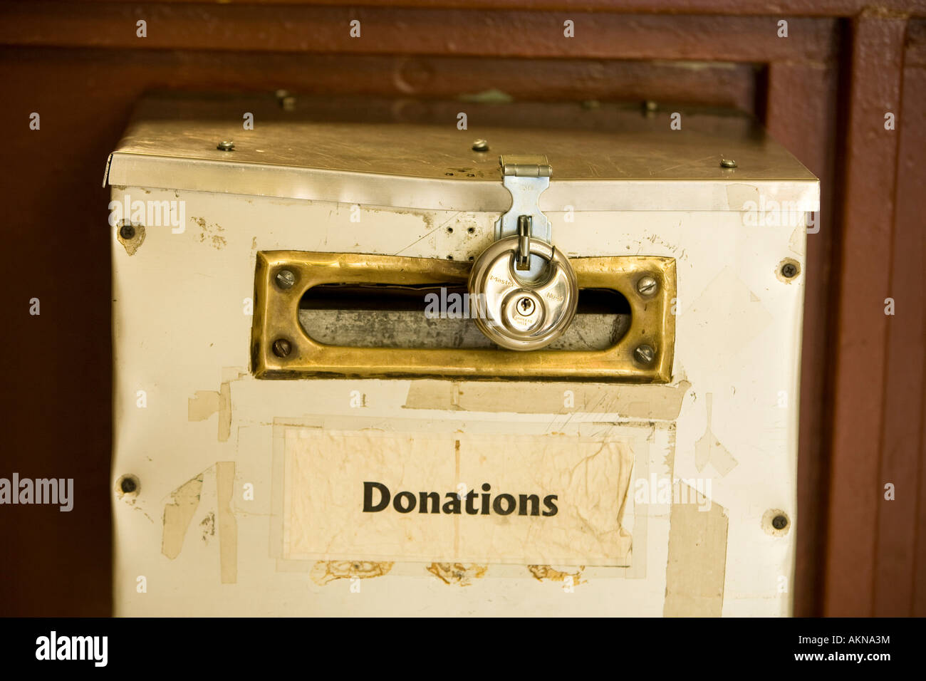 Donation box with lock Stock Photo - Alamy